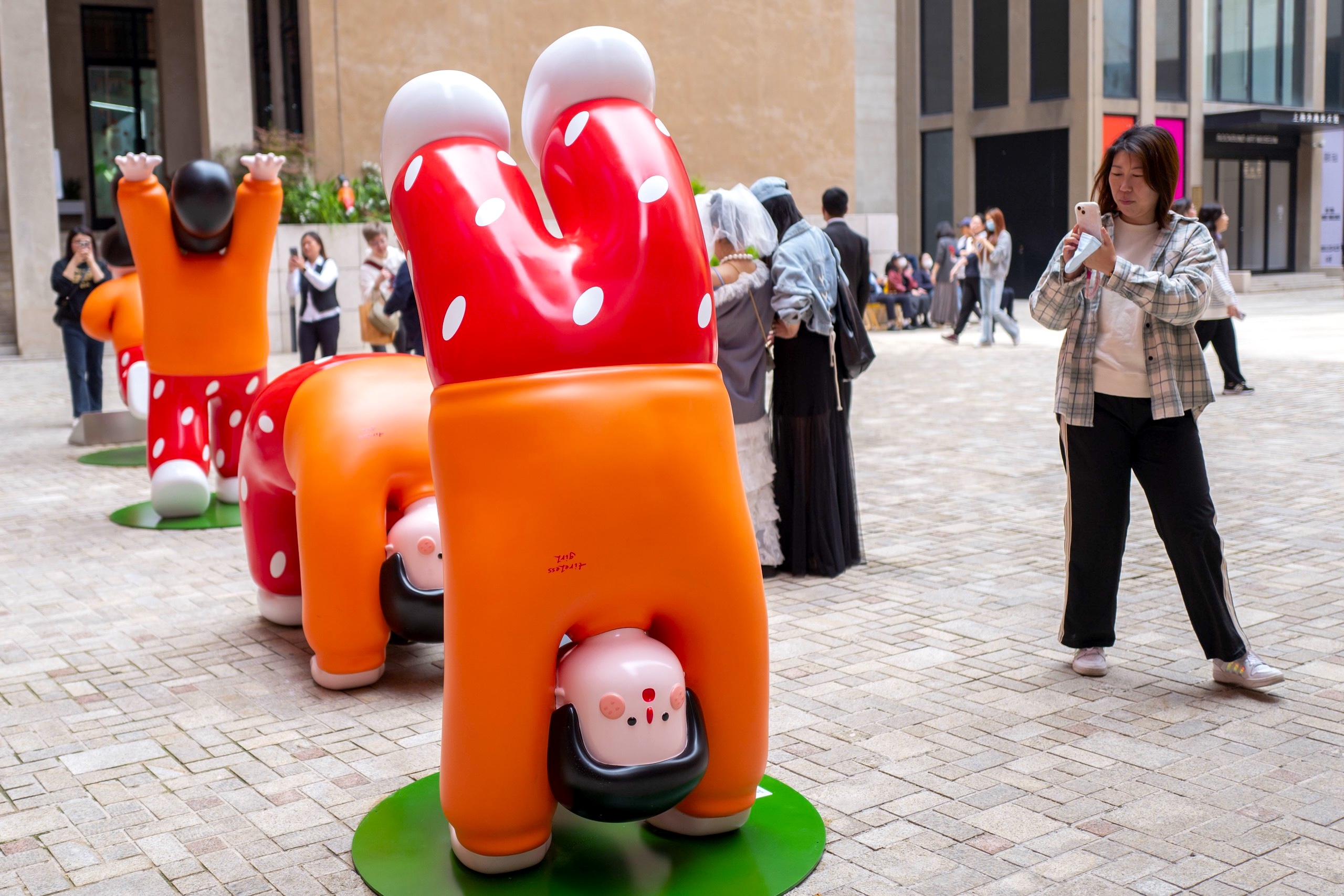 Striking 'Tireless Girl' art installations land in Shanghai