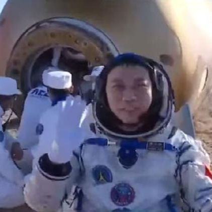 Shenzhou-17 astronauts arrive in Beijing