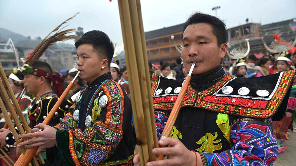 Miao people pray for harvest with lusheng dance in SW China